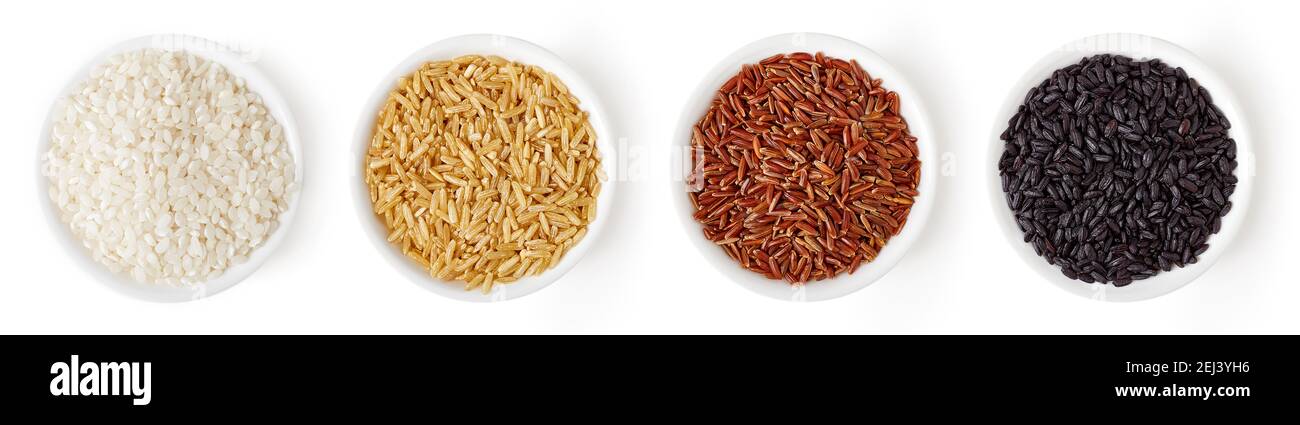 Set of various uncooked rice in white bowls isolated on white ...