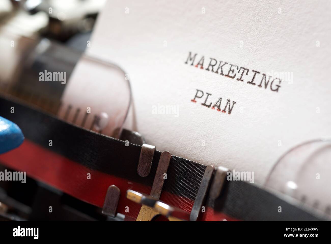 Marketing plan phrase written with a typewriter Stock Photo - Alamy
