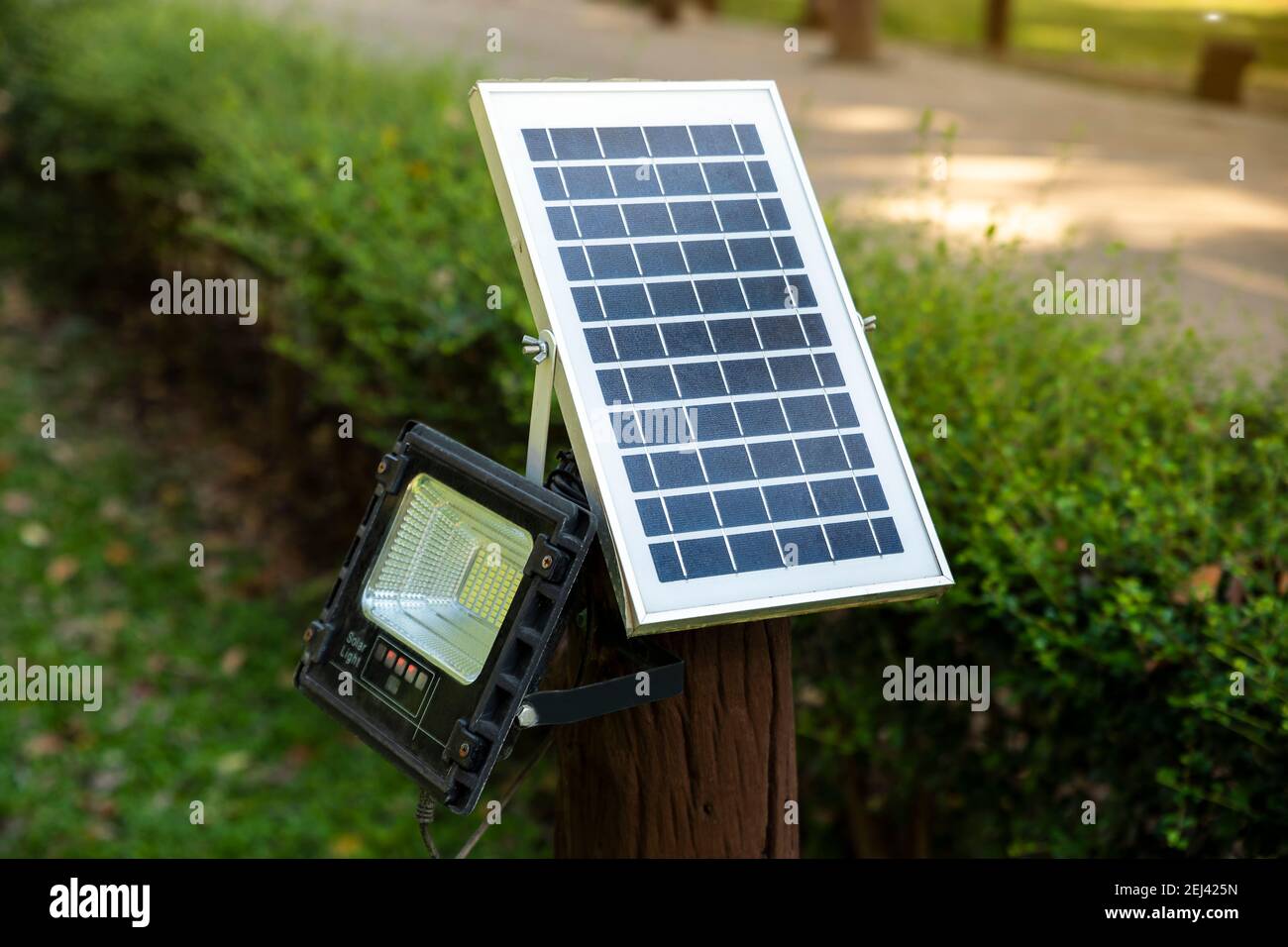 Ecological electrical energy from solar panel in field. Solar cell lamp ...