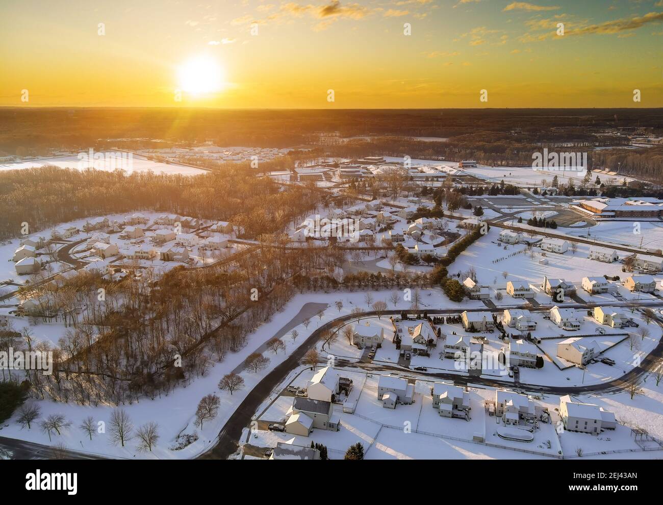 Amazing winter landscape sunset scenery in residential streets after ...