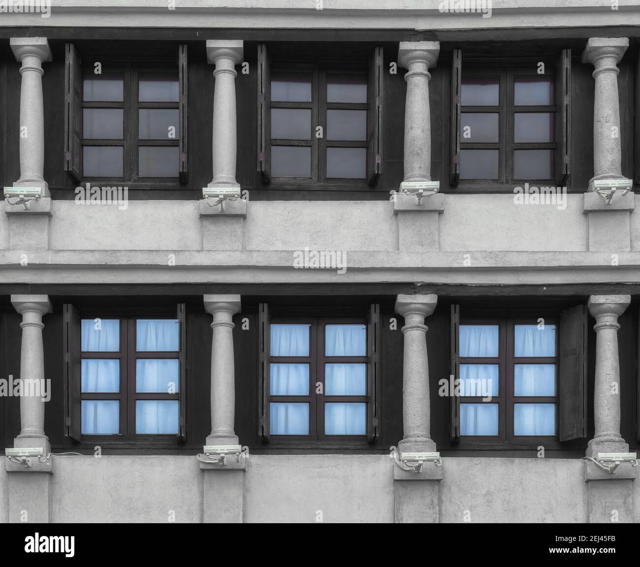A closeup view of the windows with different colorations and the ...