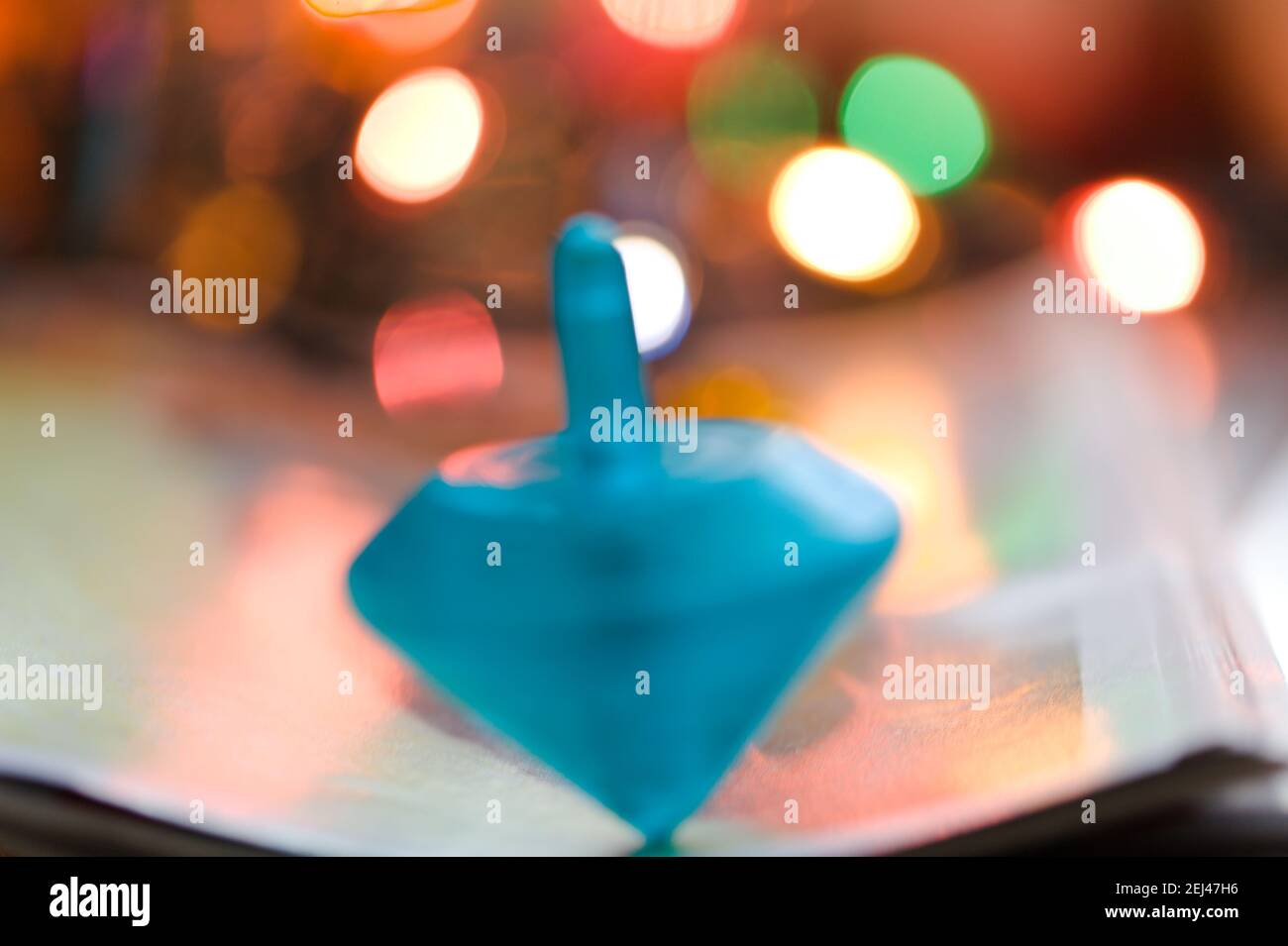 Energy of Motion - Close-up of a blue spinning top in motion Stock ...