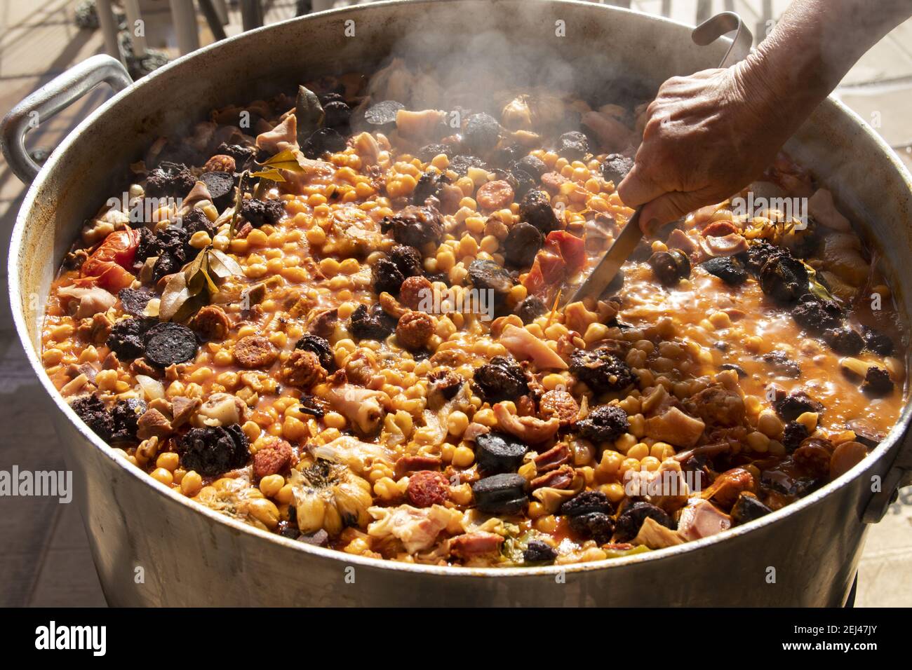 A high angle shot of a big pot filled with a delicious traditional food ...
