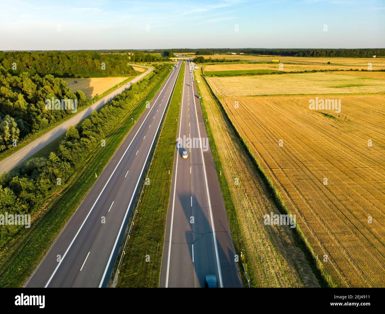 Aerial view of a highway road. Cars passing, highway junction, cross ...