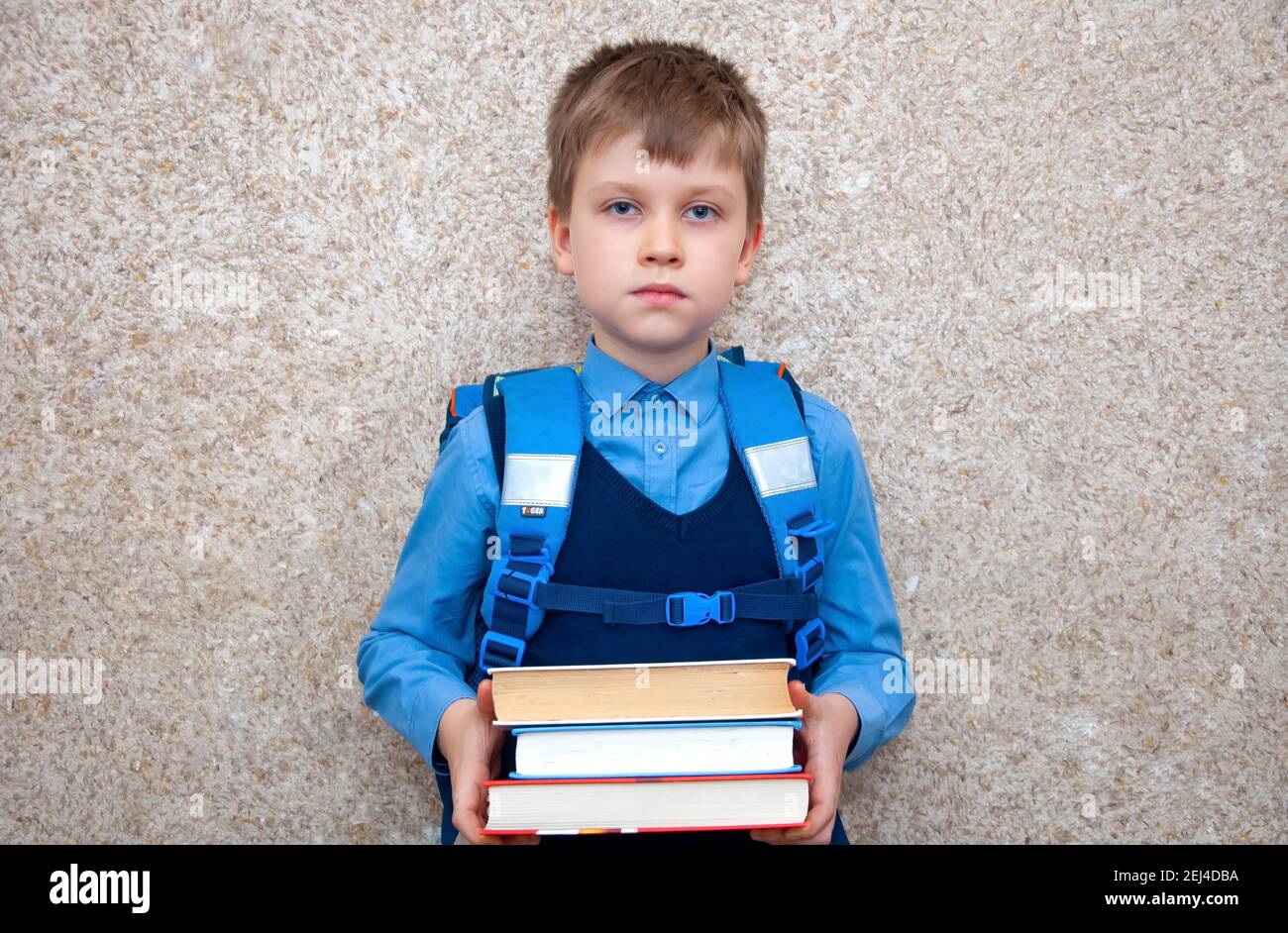 Child boy with books and briefcase for school Stock Photo - Alamy