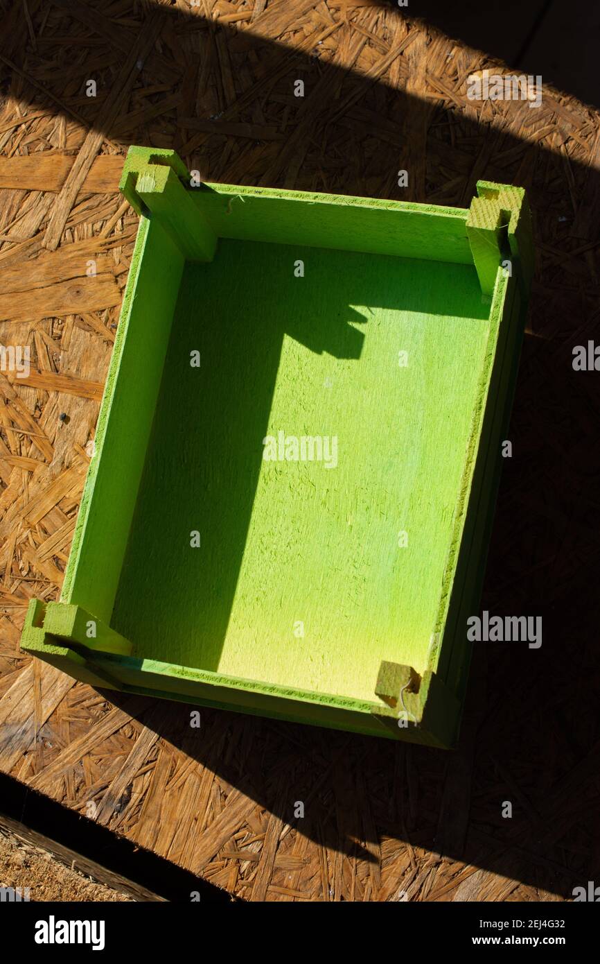 Wooden empty crate box for sale in a market Stock Photo - Alamy