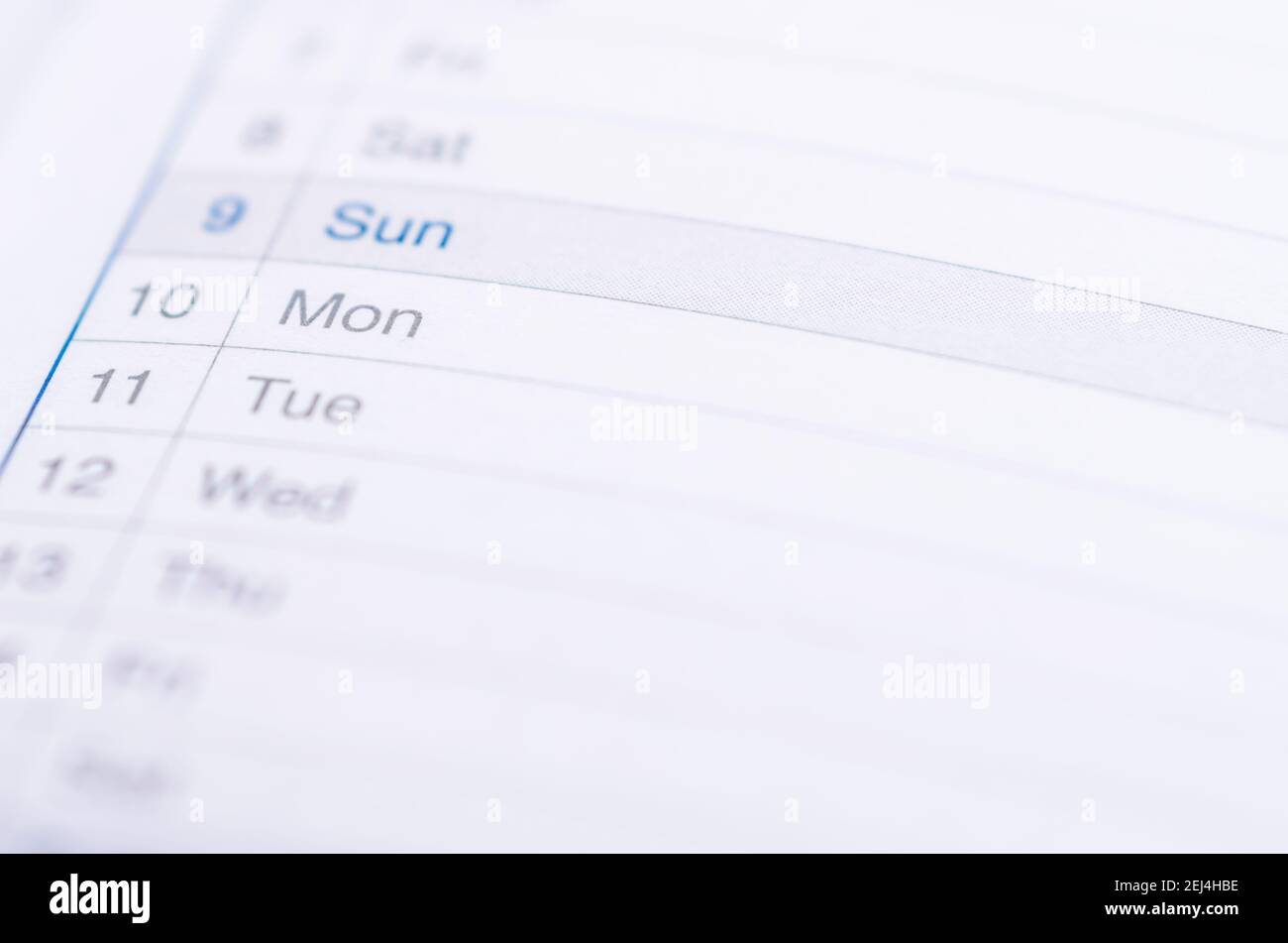 Close up Of Blank White Calendar Page With Days Of The Week Copy Space close-up-of-blank-white-calendar-page-with-days-of-the-week-copy-space
