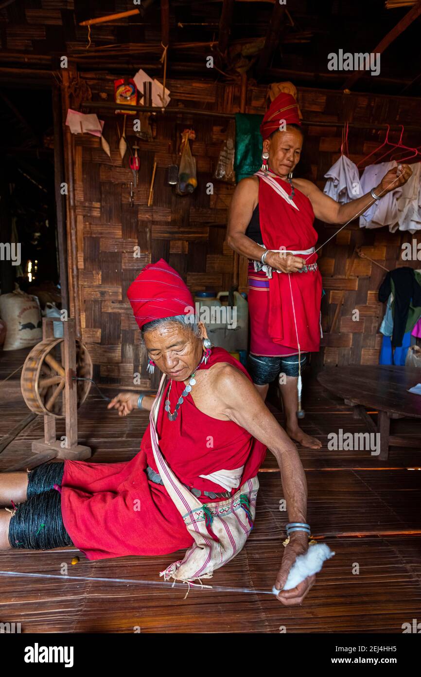 Old Kayan women weaving the traditional way, Kayah village, Loikaw area ...