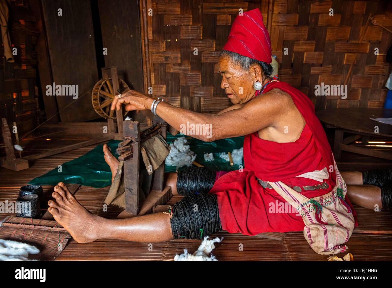 Old Kayan women weaving the traditional way, Kayah village, Loikaw area ...
