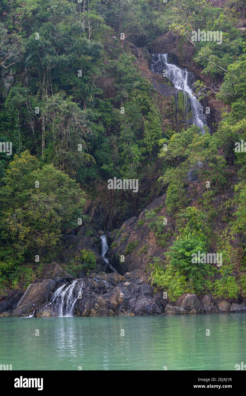 Waterfall dropping right in the ocean on Dome island, Mergui or Myeik ...