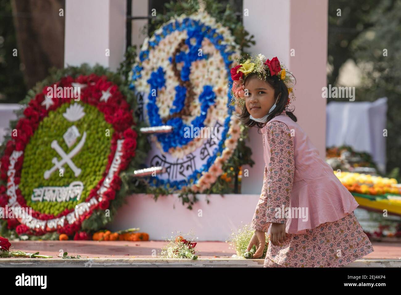 A Bangladeshi child pays tribute at the Martyr's Monument, or Shaheed ...