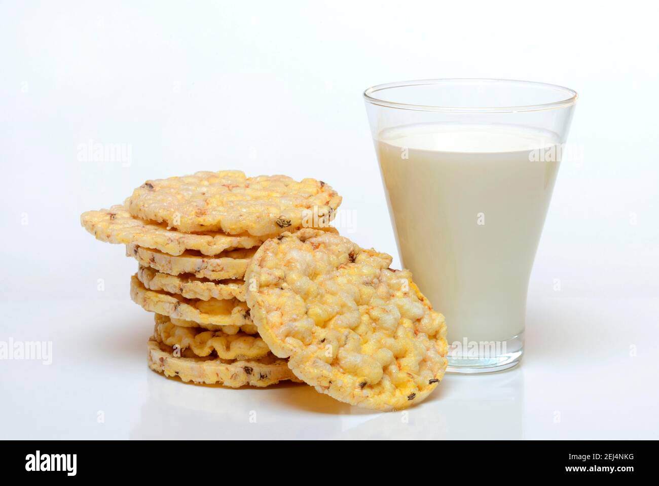 Corn wafers and corn kernels, corn crackers, glass of milk Stock Photo ...