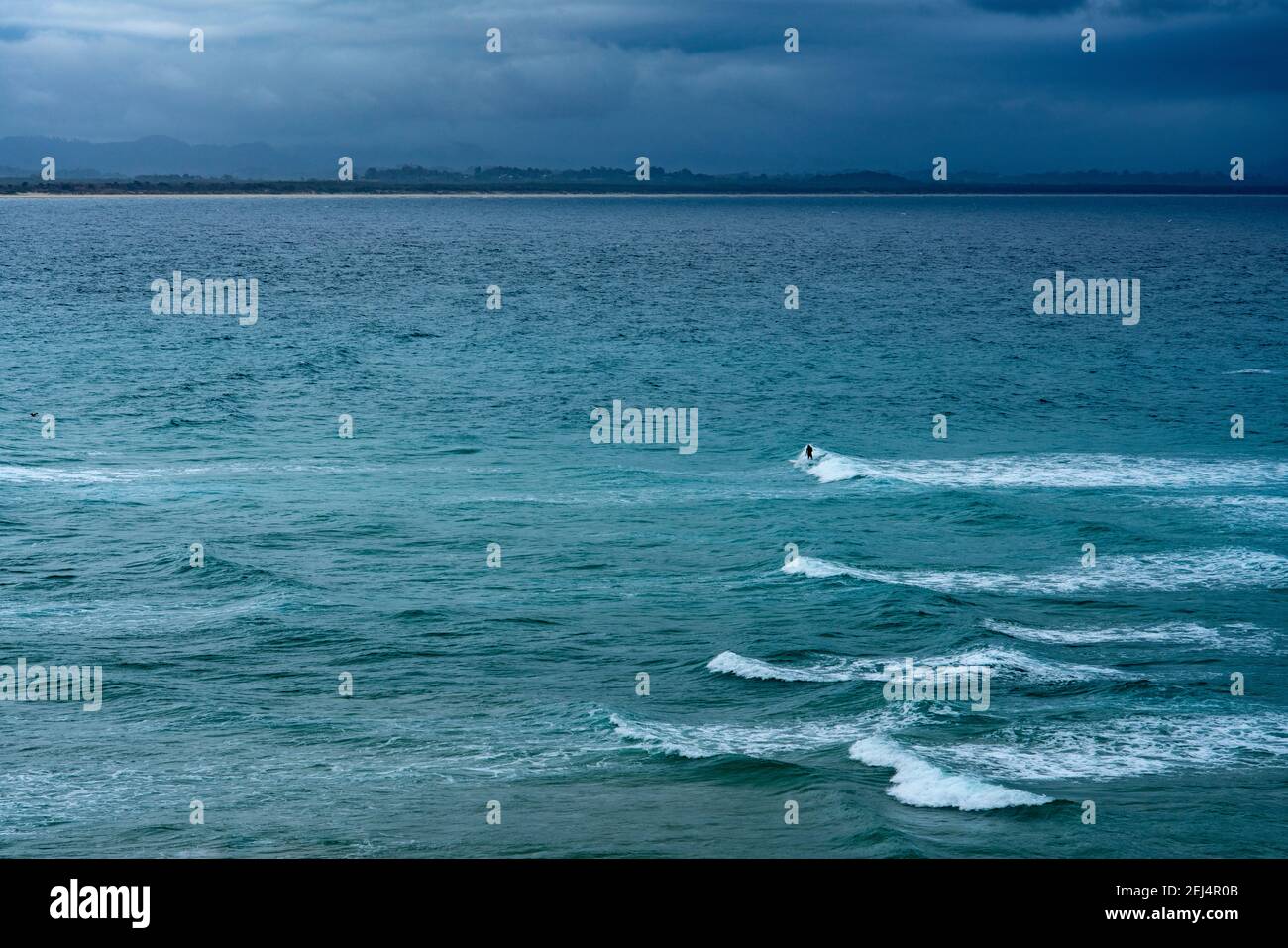 Surfers in storm hi-res stock photography and images - Alamy