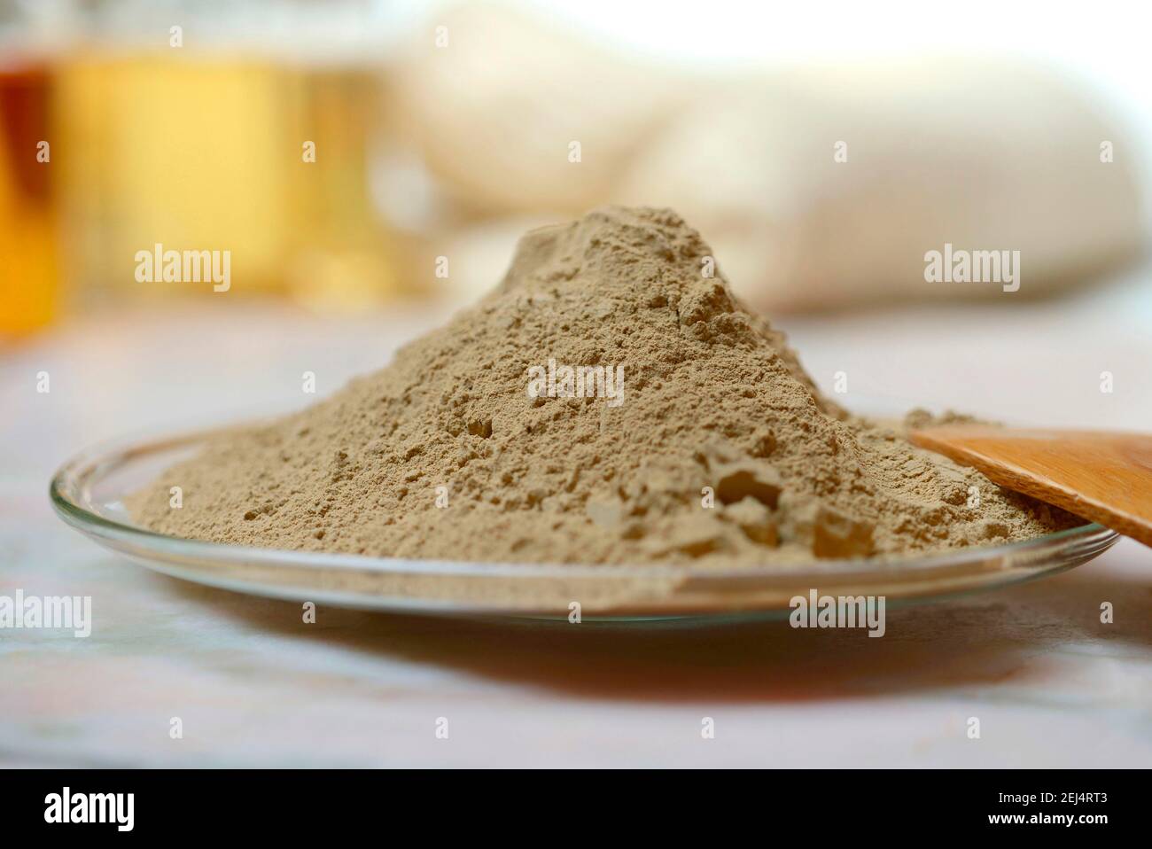 Alumina, healing earth powder on glass plate Stock Photo - Alamy