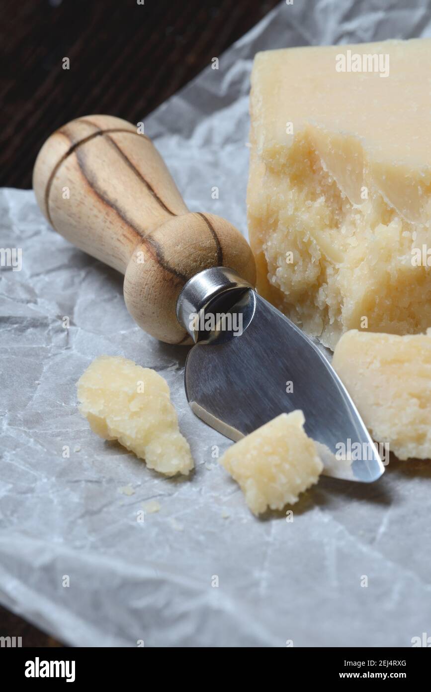 Parmesan with cheese knife, Grana Padano, cheese knife Stock Photo - Alamy