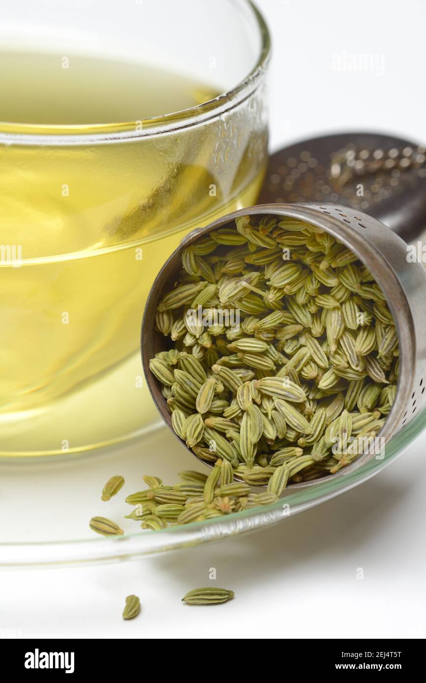 Fennel tea in cup and fennel seeds in spoon, fennel tea Stock Photo - Alamy