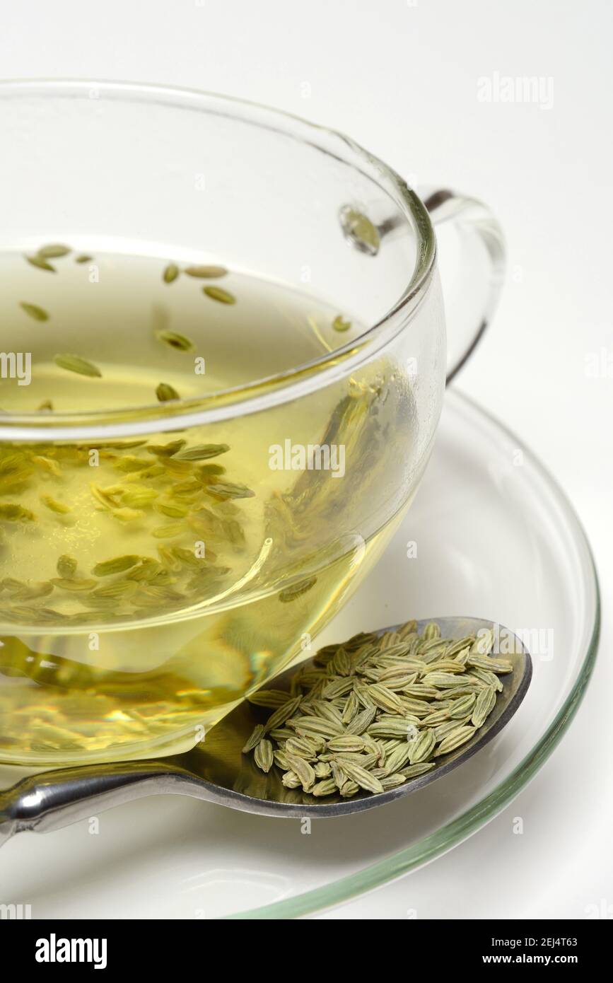 Fennel tea in cup and fennel seeds in spoon, fennel tea Stock Photo - Alamy
