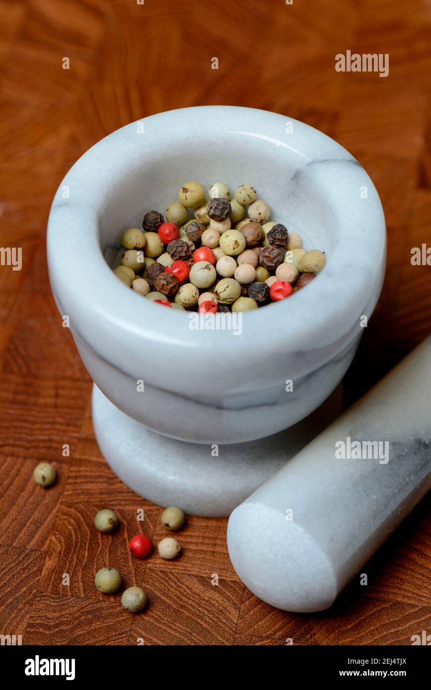 Peppercorns in grated shell, pepper, white, green, black ( Piper nigrum ...