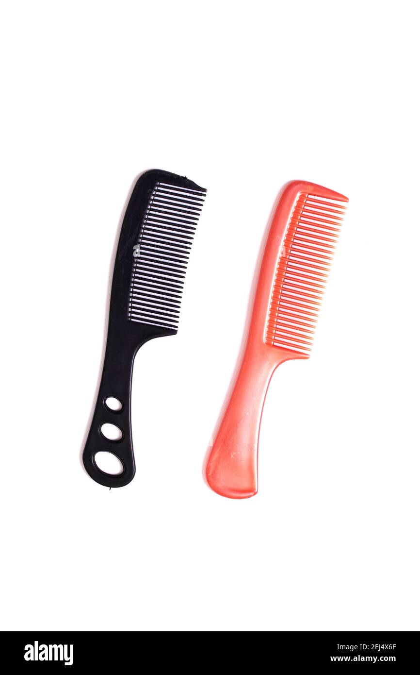 Two plastic combs isolated on a white background Stock Photo - Alamy