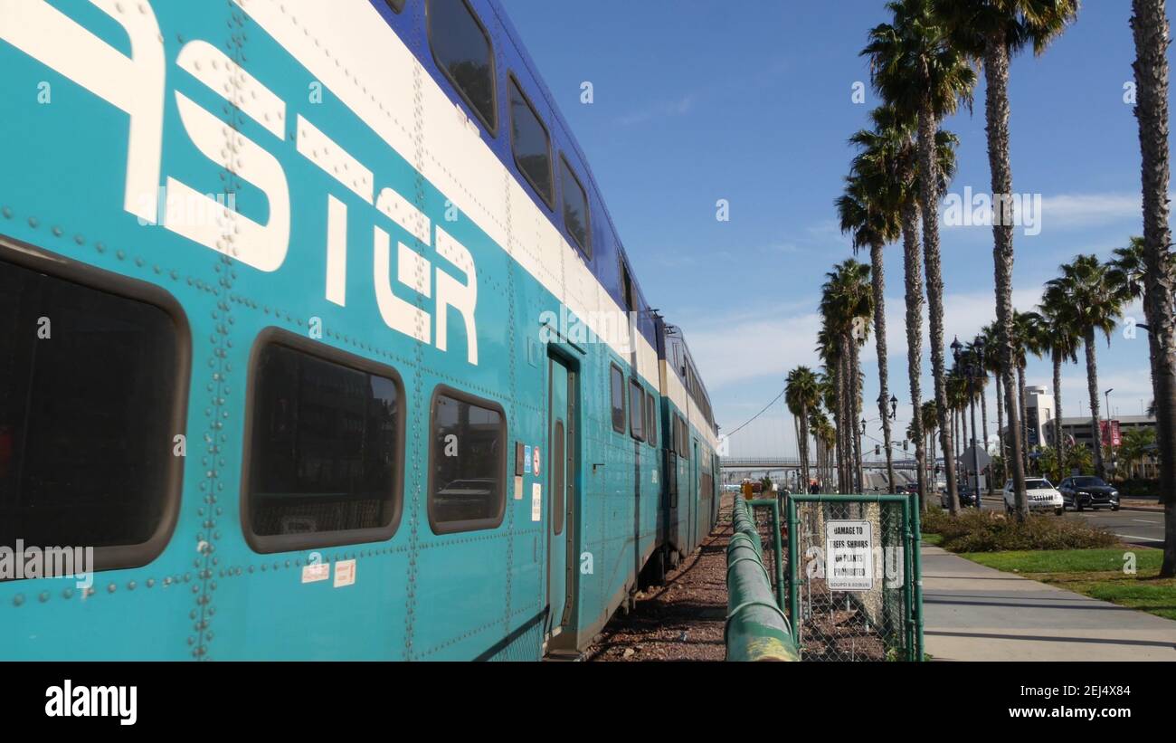 SAN DIEGO, CALIFORNIA USA - 13 FEB 2020: Coaster Commuter and palms ...