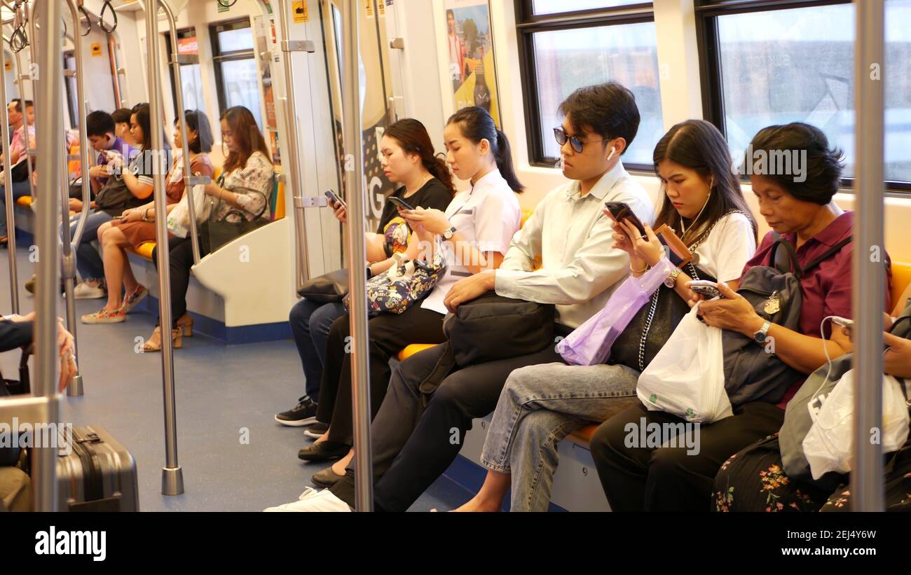 People mobile phones crowd looking at hi-res stock photography and ...