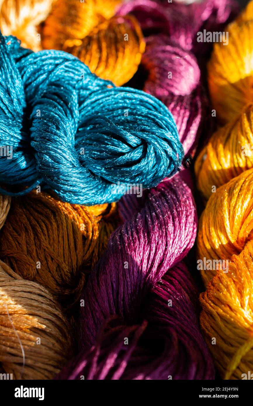 Colorful strands of silk thread close up texture background Stock Photo ...