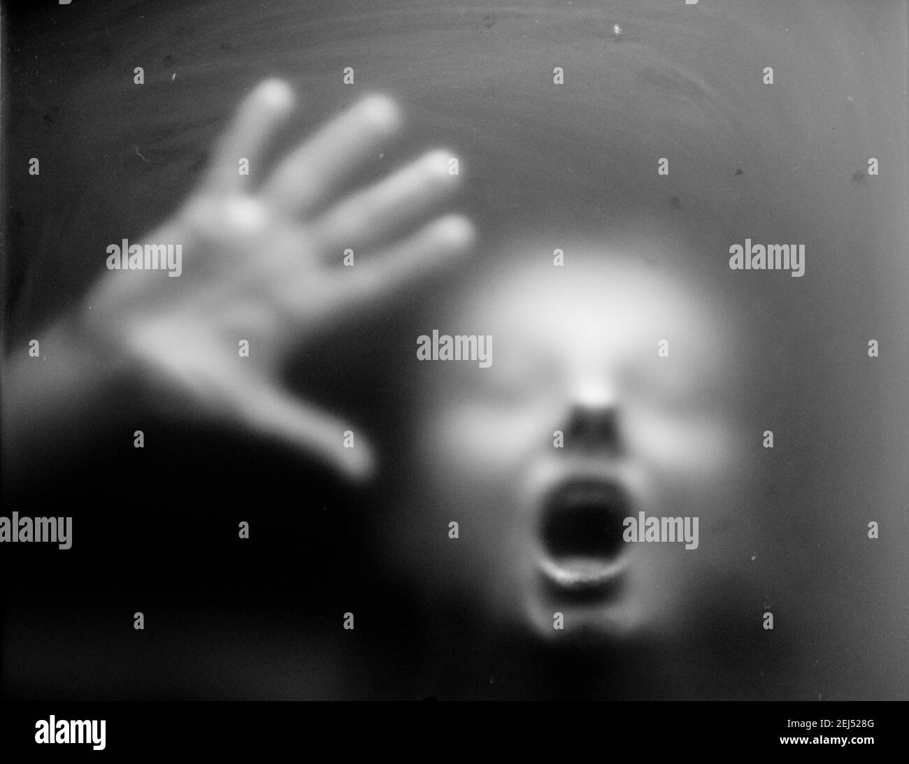 Curtain window hand Black and White Stock Photos & Images - Alamy