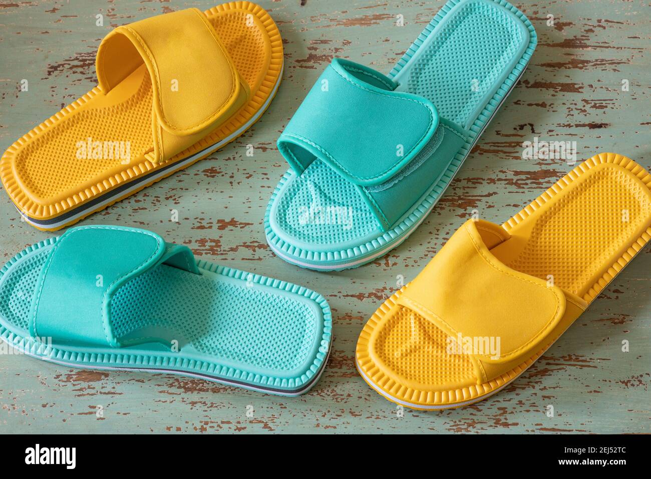 Variously colored flip-flops for walking on the house or the beach ...