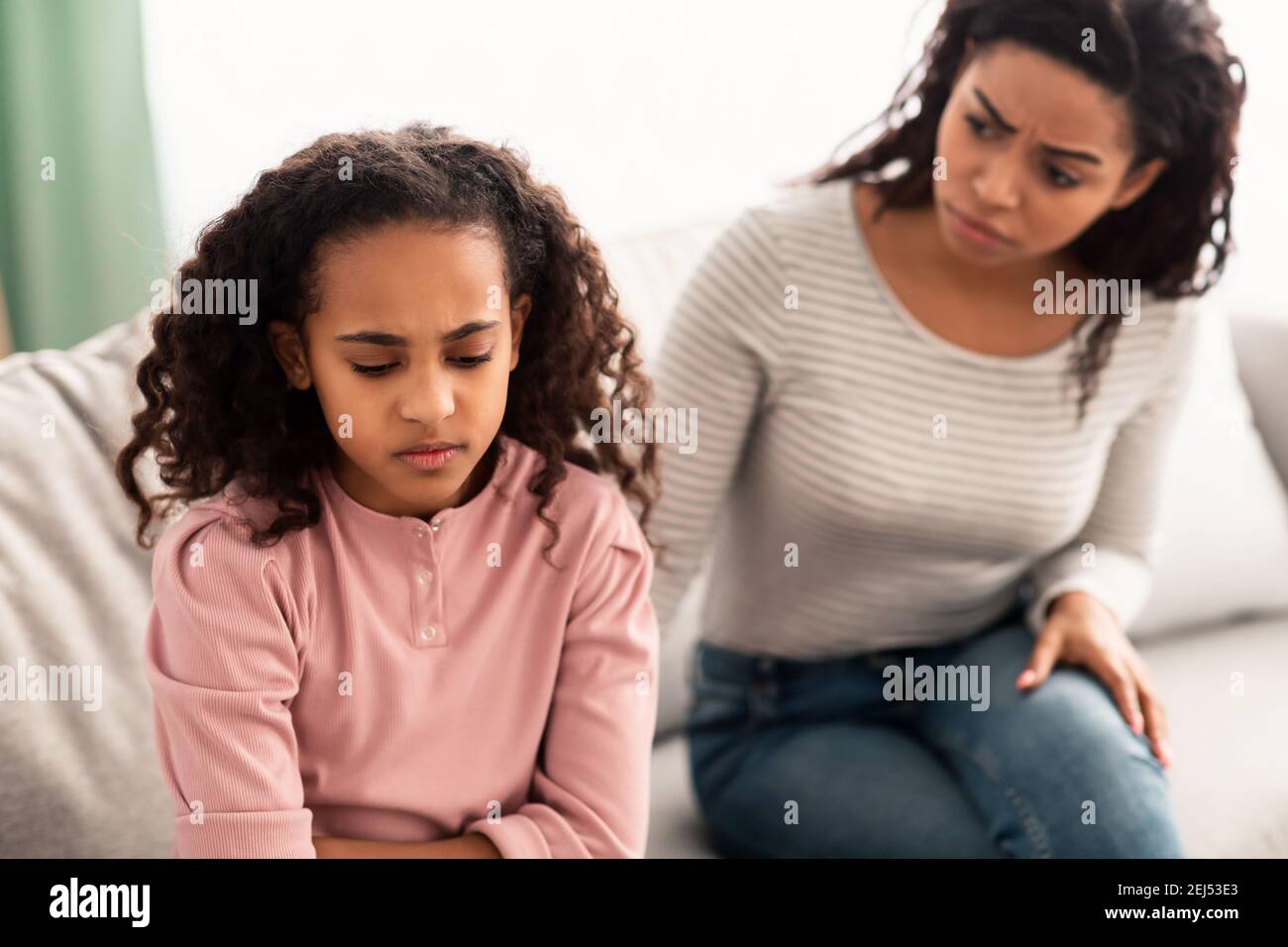 Family Conflict. Sad black daughter and mother after quarrel Stock ...