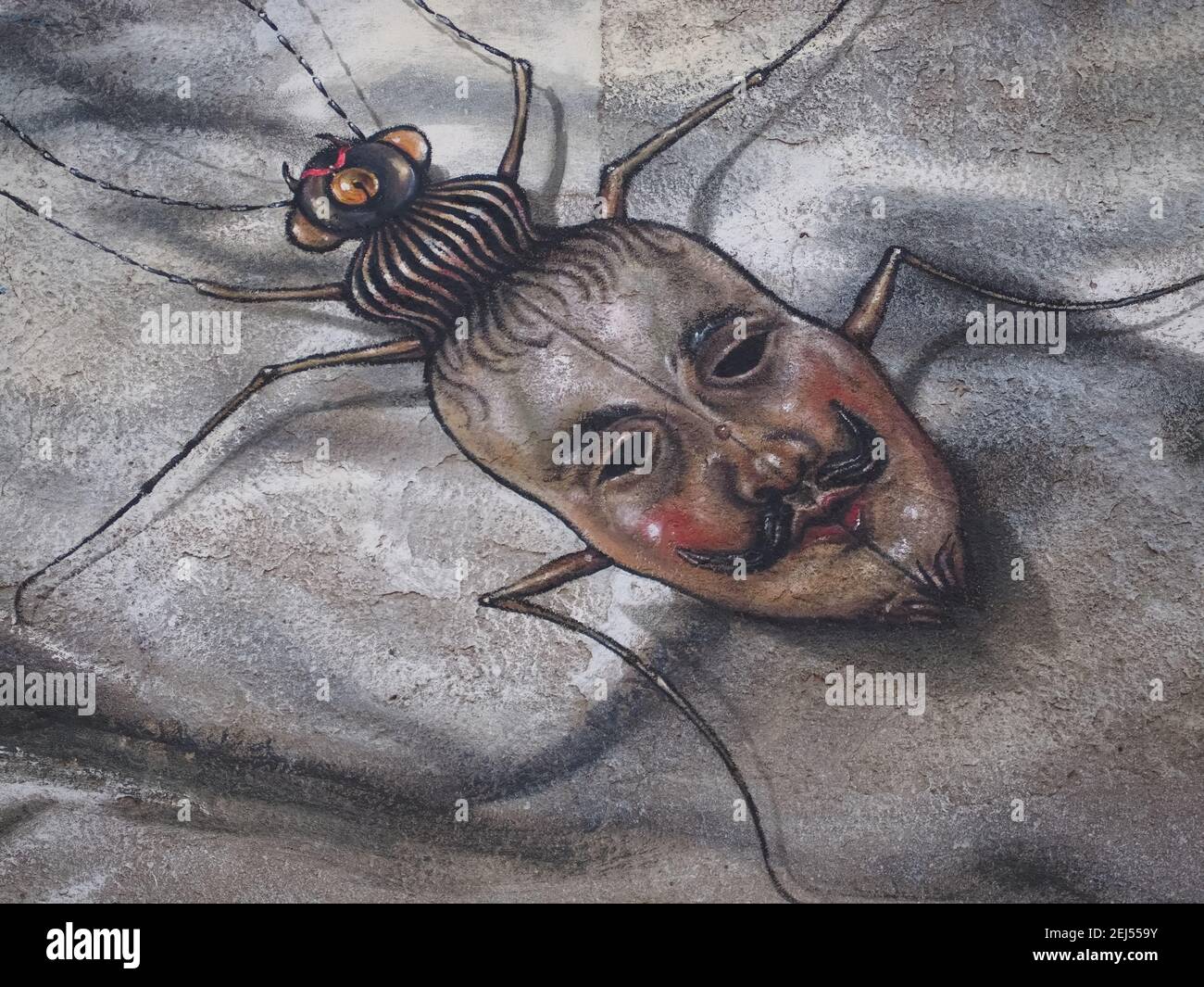 Street art in Duesseldorf - Graffiti of an insect with a mask Stock ...
