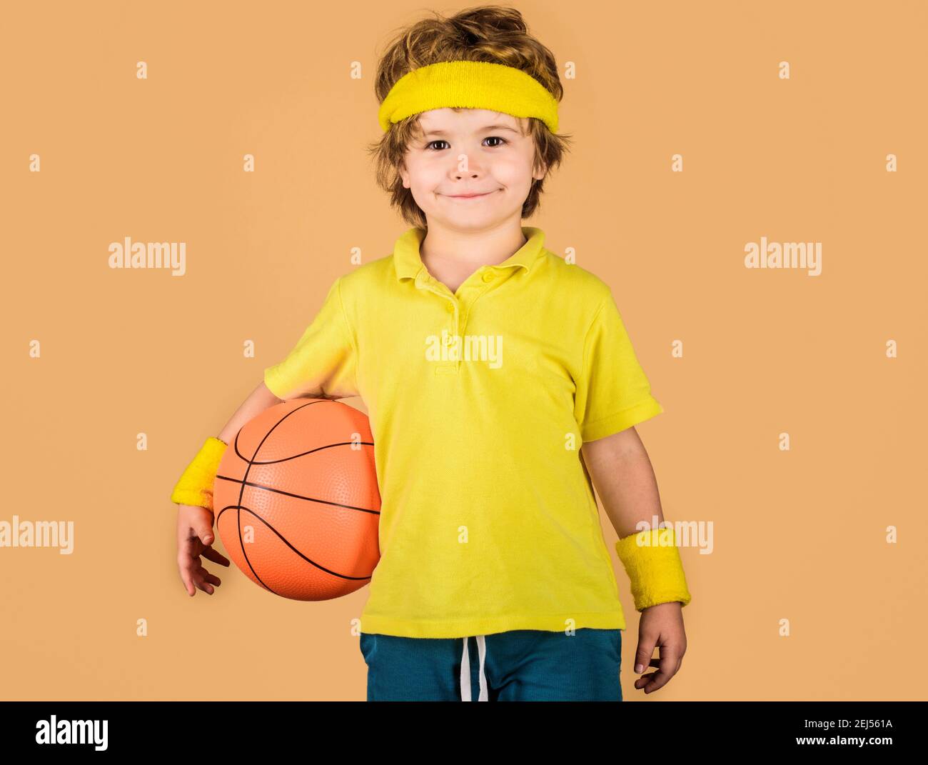 Sport kid. Smiling child with basketball ball. Kids activities. Little ...