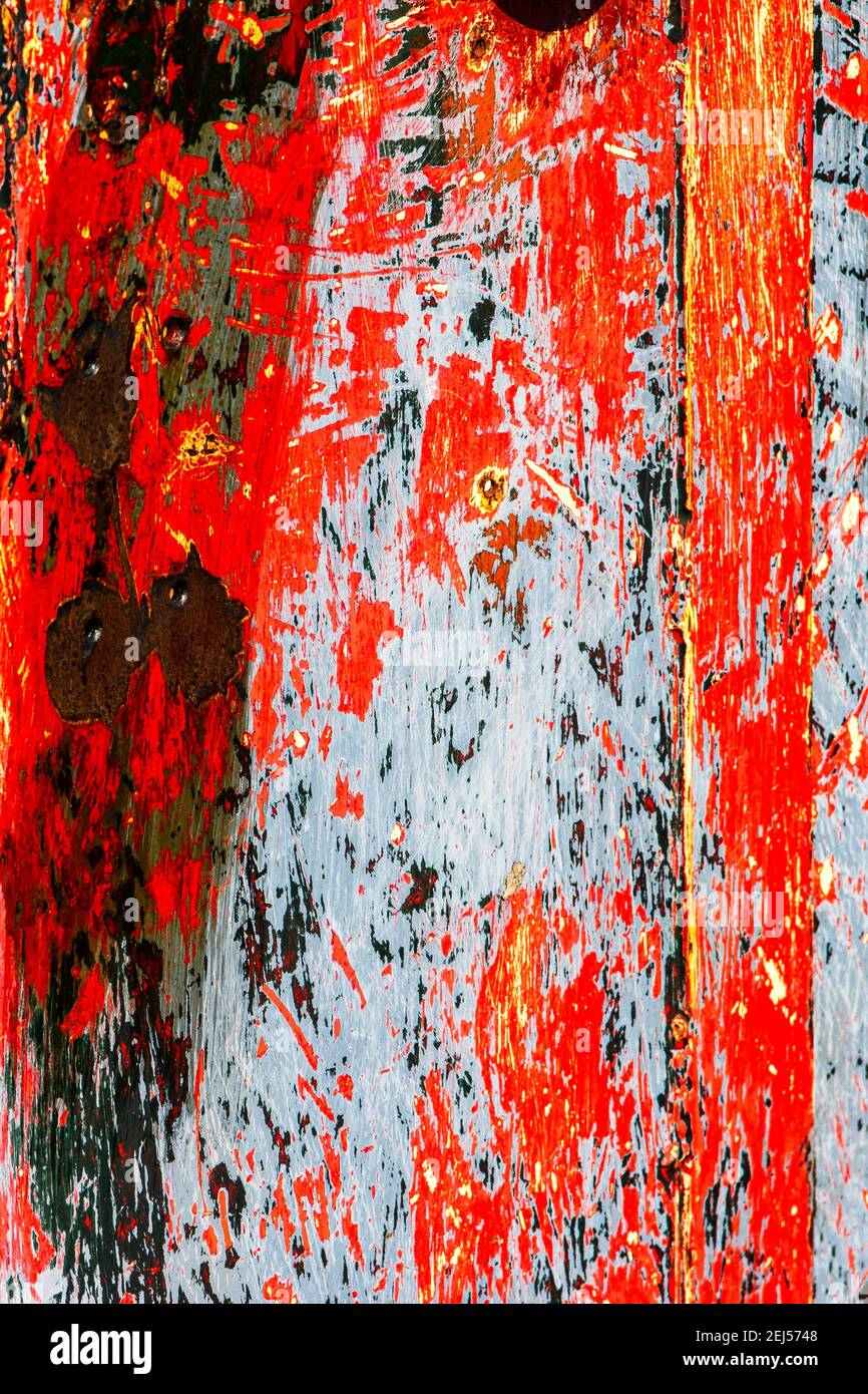 Abstract background pattern of flaking paint on the hull of a canal ...