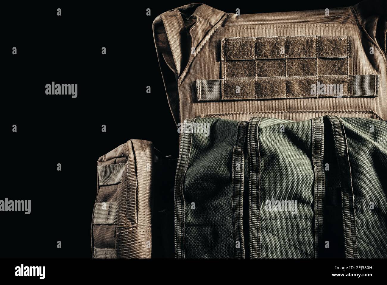 Photo of tactical military soldier armored vest with pouches close-up ...