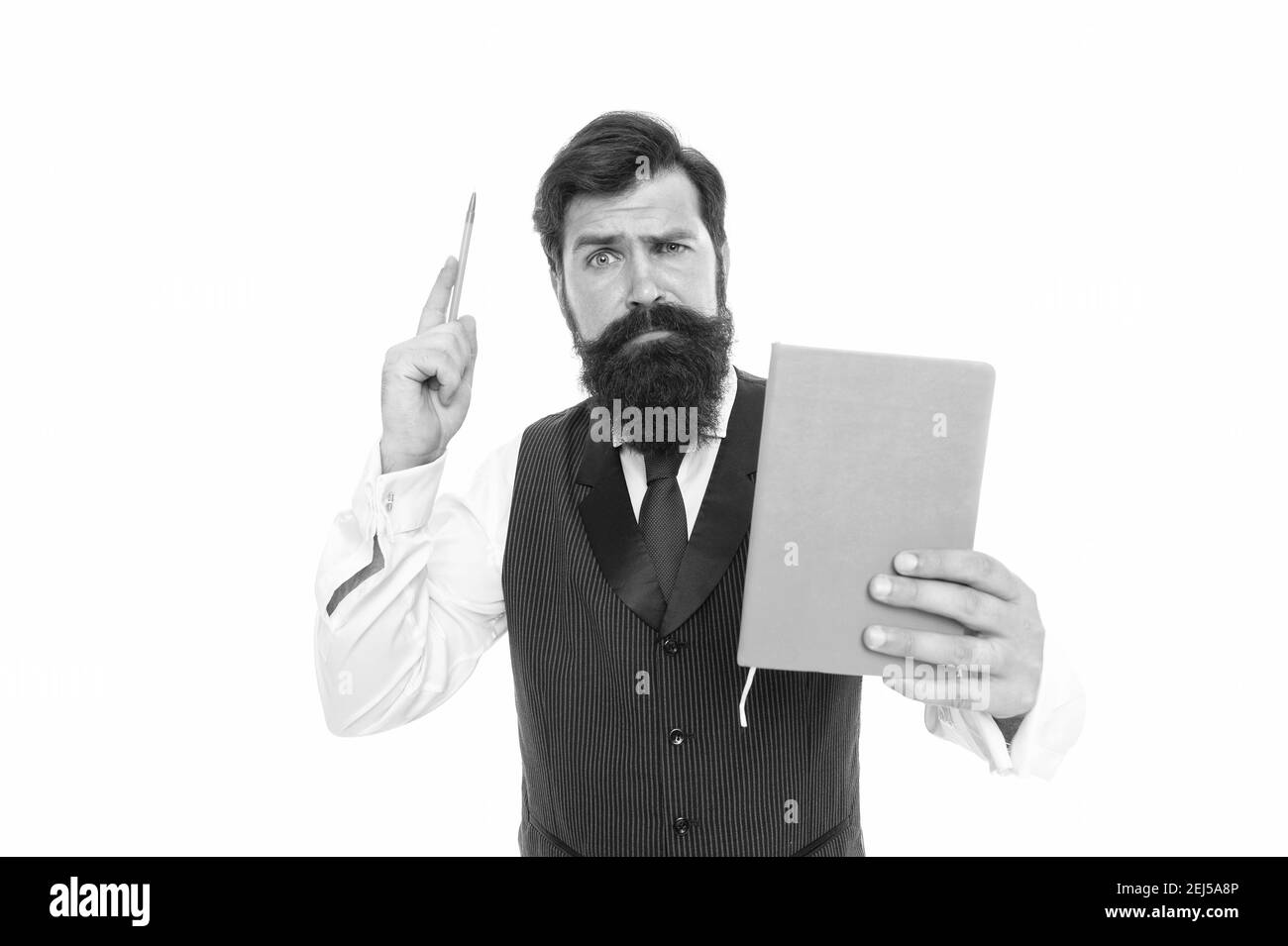 Reading broadens imagination. Male teacher raise pen holding book ...