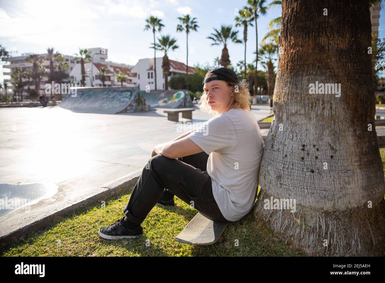 Portrait of the face of a tired Skater who spent the whole day at the ...