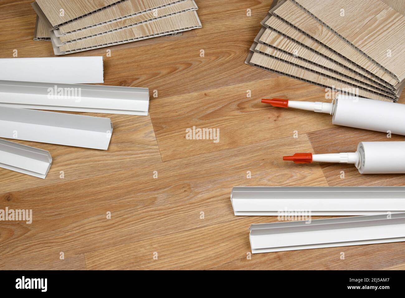 Set of items for PVC ceiling indoor works. Assembly adhesive bottles ...