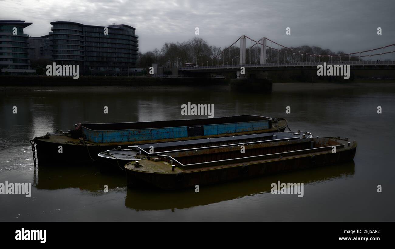Three empty barges static on the River Thames London Stock Photo - Alamy