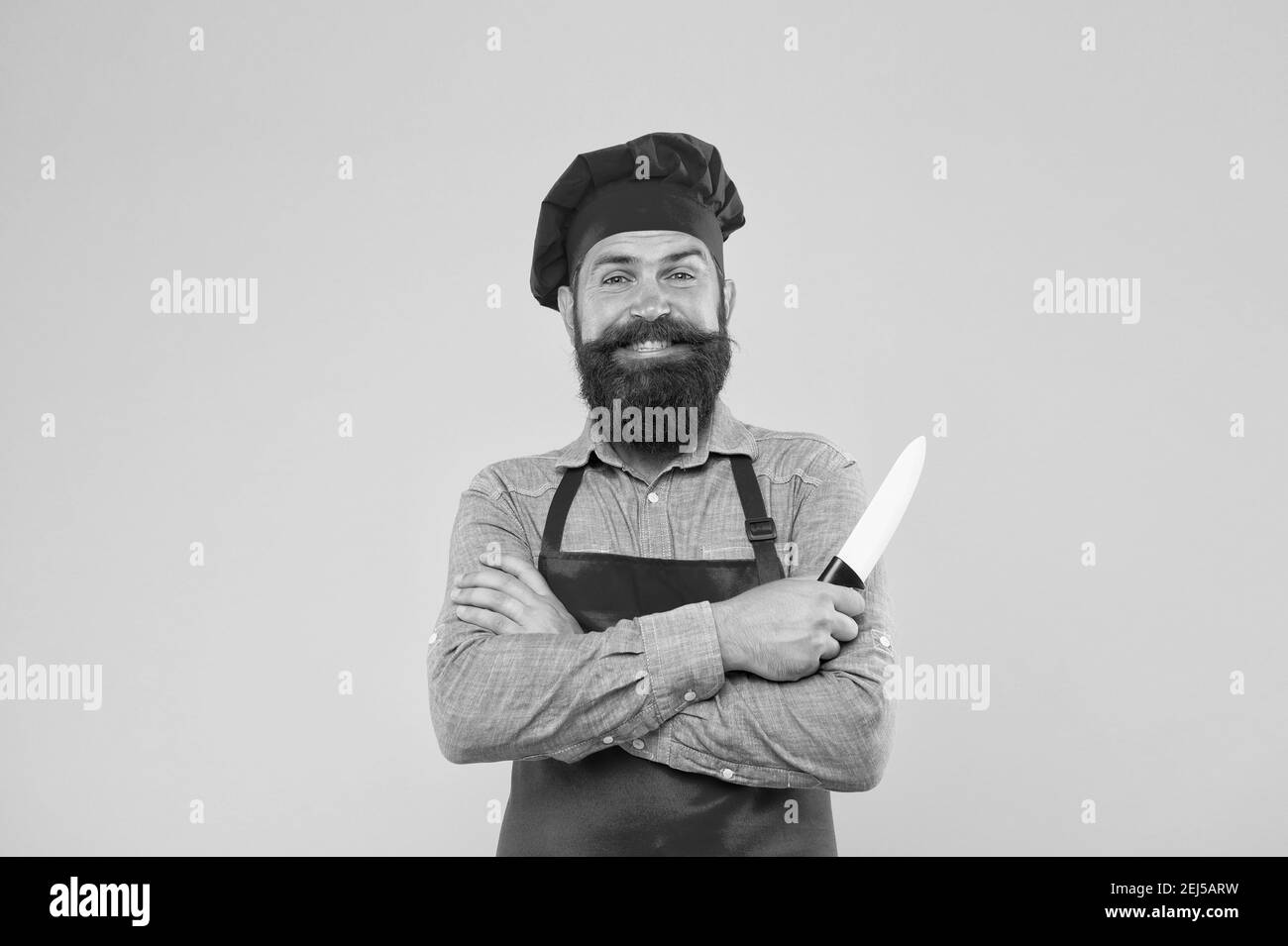 Hipster cook chopping and dicing using professional knife Stock Photo ...