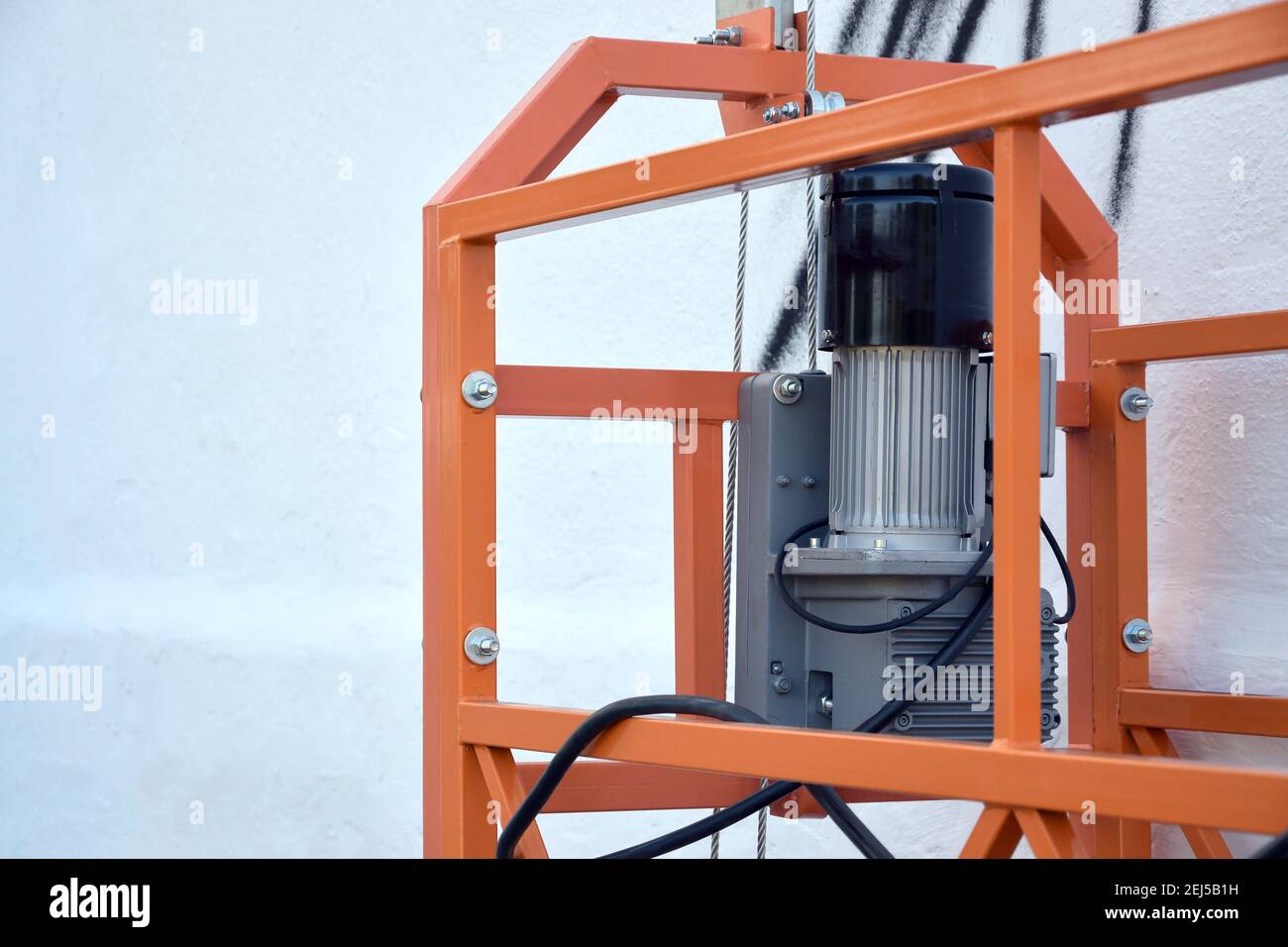 Hoist supply and safety lock as part of suspended wire rope platform ...