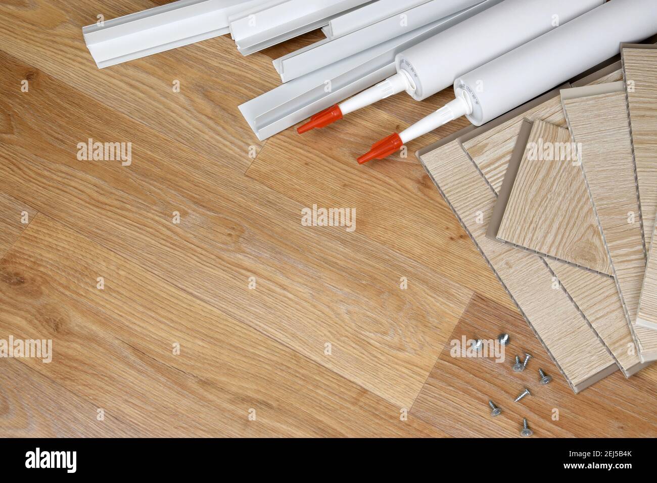 Set of items for PVC ceiling indoor works. Assembly adhesive bottles ...