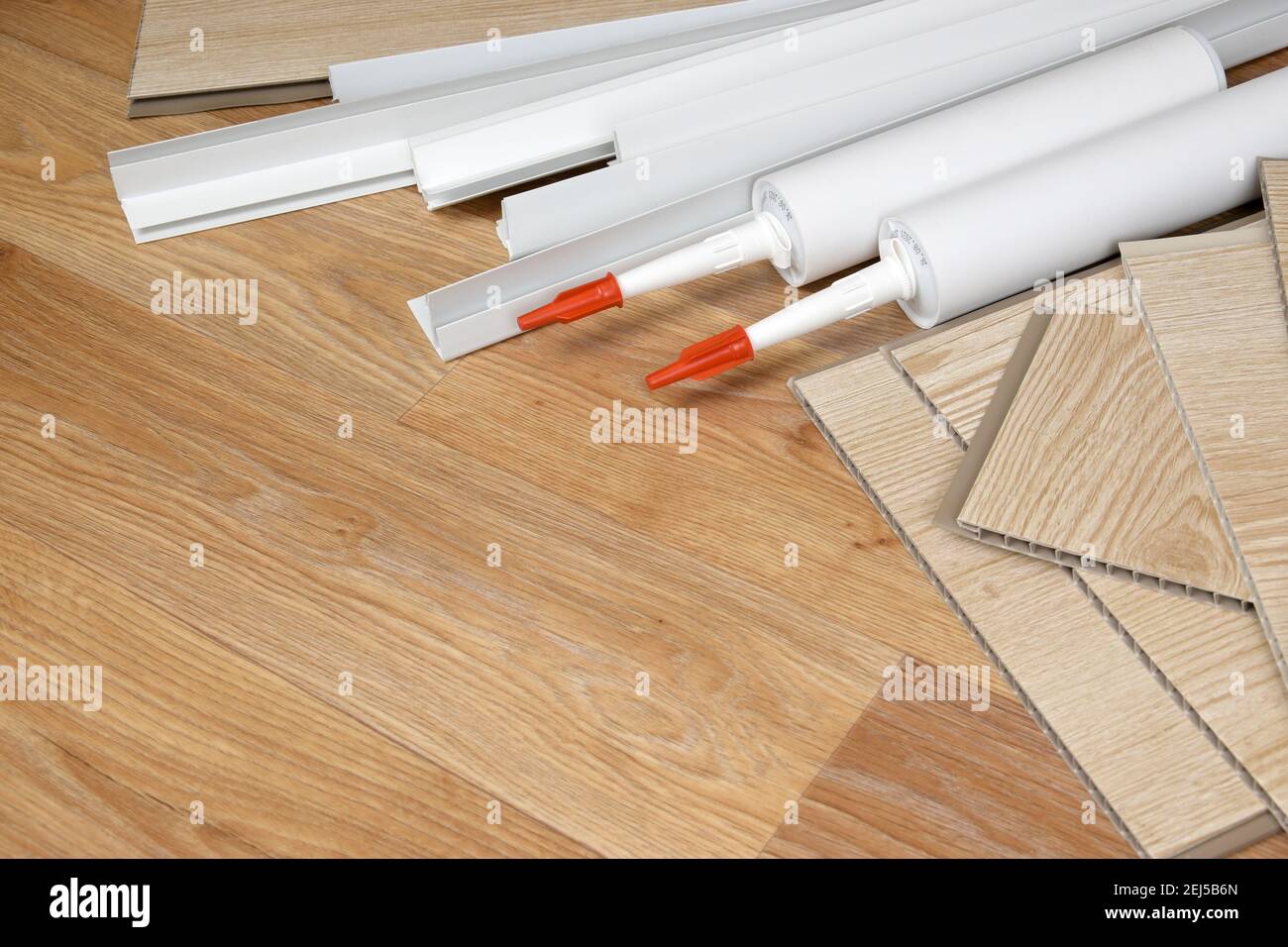 Set of items for PVC ceiling indoor works. Assembly adhesive bottles ...