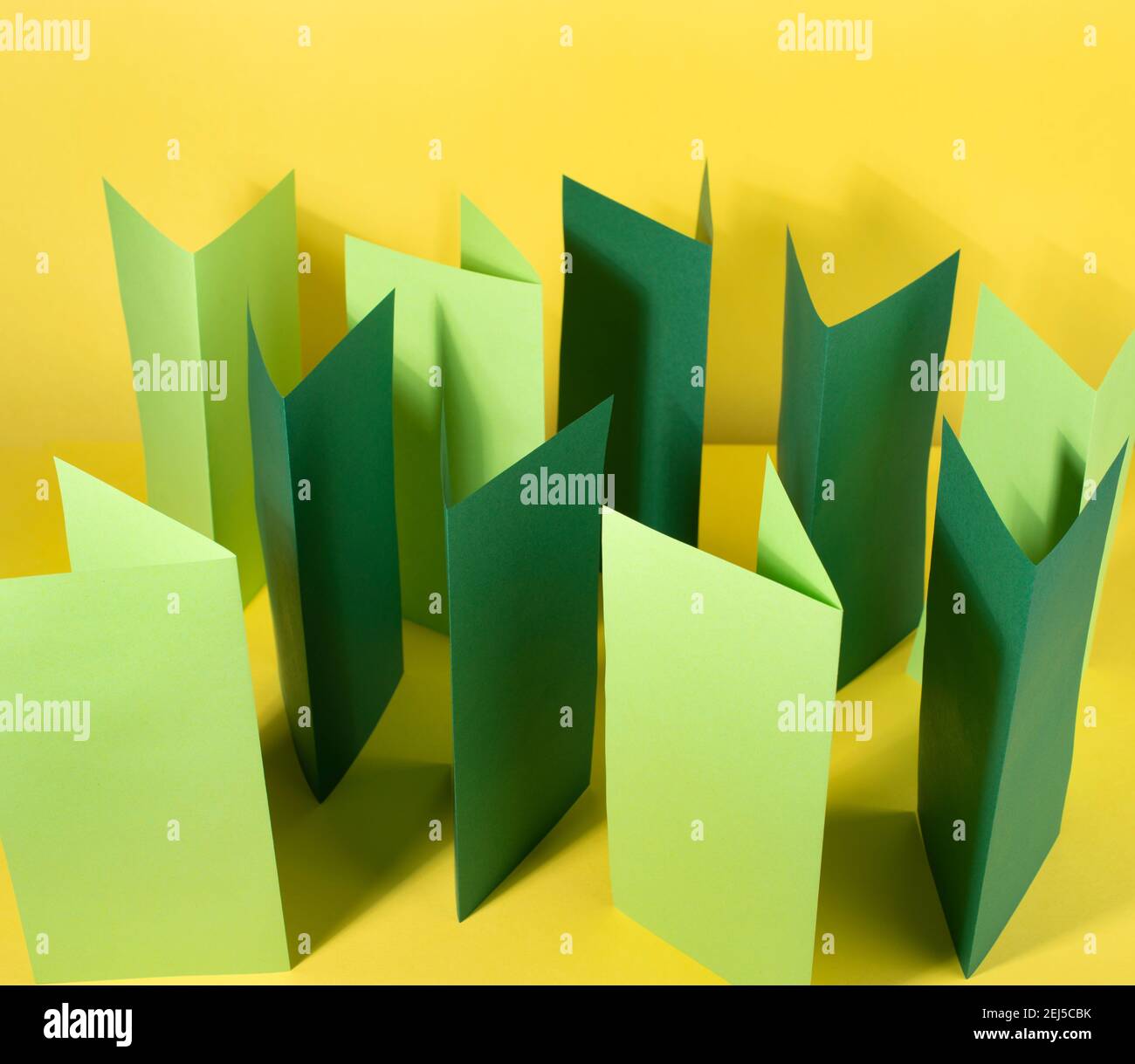 Abstract colour paper background. Green geometrical composition ...