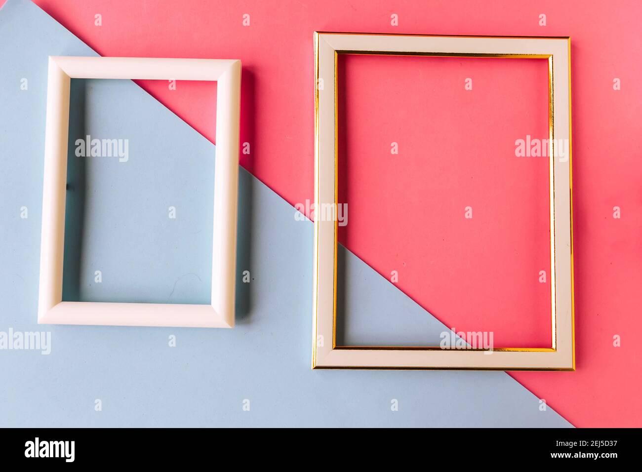 Two photo frames on geometric background, copy space for the text ...