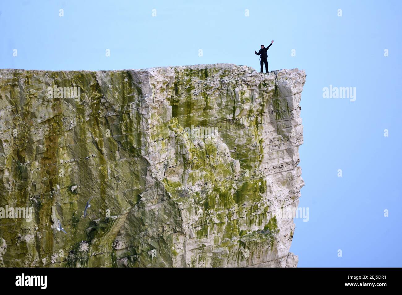 Man On Cliff Edge