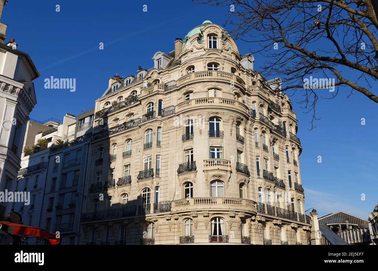 Traditional French house with typical balconies and windows. Paris ...