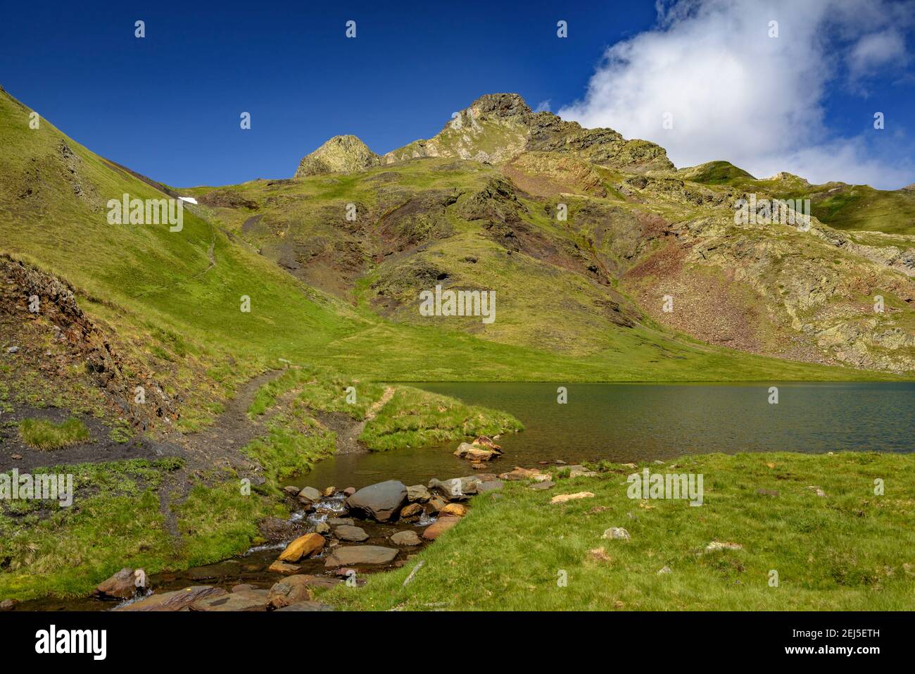 Montoliu lake. In the background, Maubèrme's summit (Aran Valley ...
