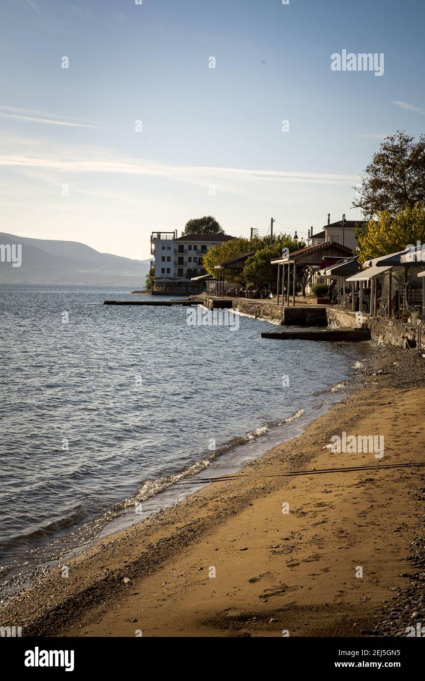 A vertical shot of buildings on the sandy shore near the sea Stock ...