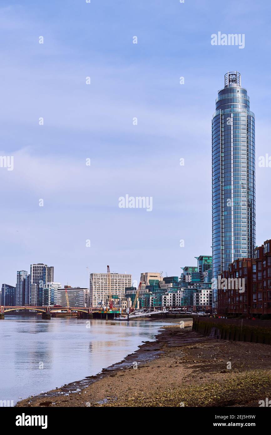 View downstream of River Thames at low tide with river bed exposed ...