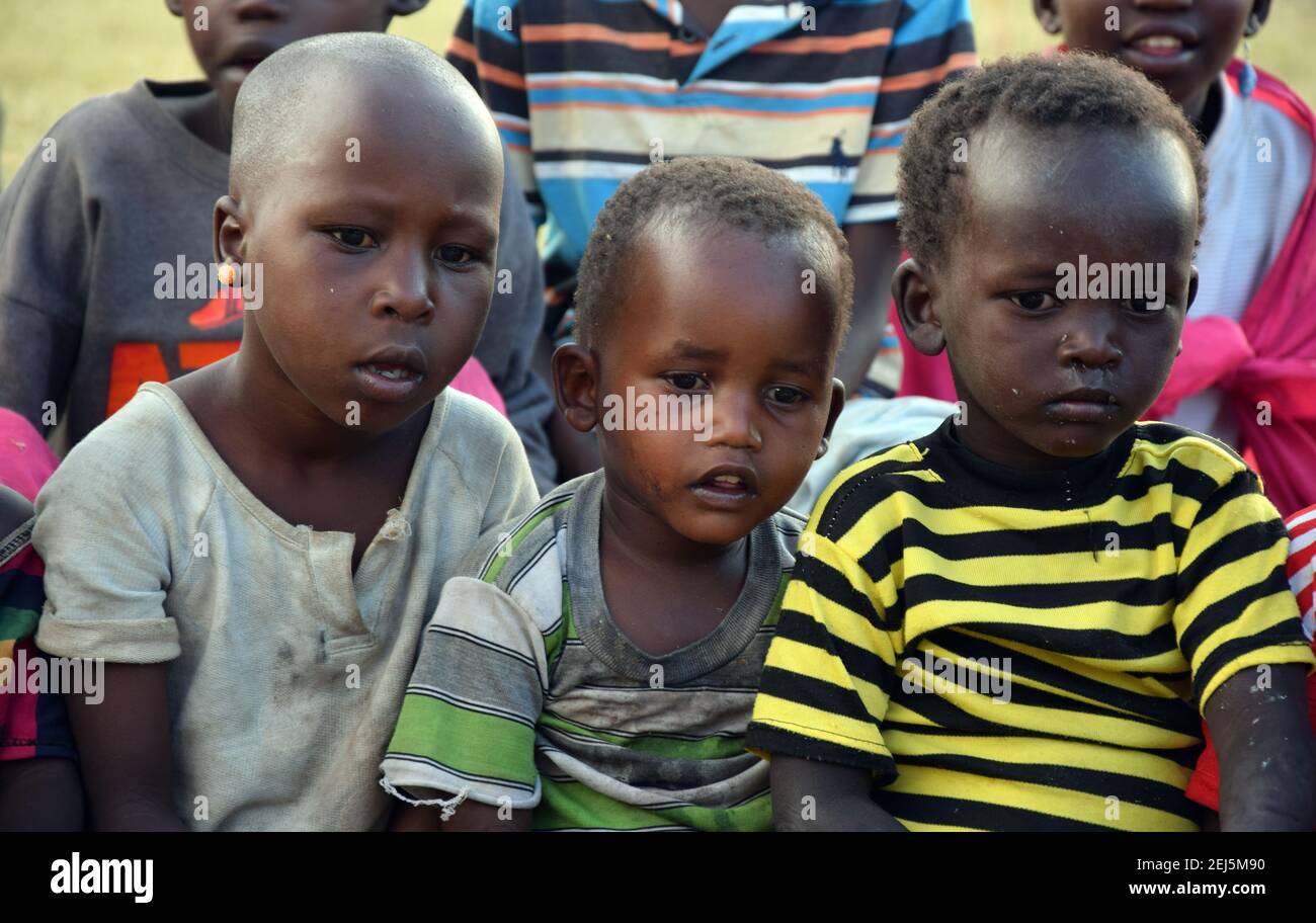 Group of unknown children from a Masai tribe in Kenya Stock Photo - Alamy