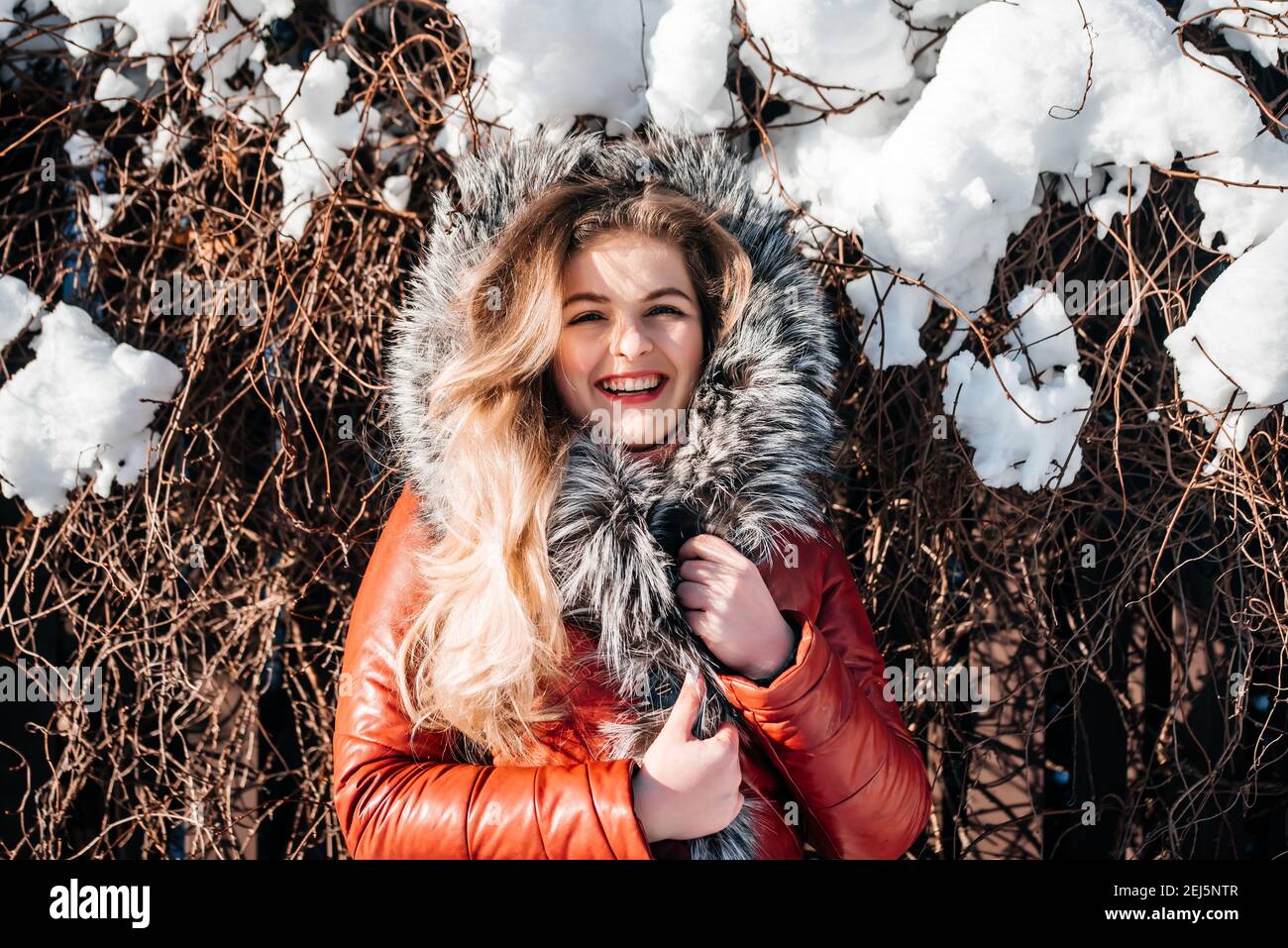 Outdoor portrait of young beautiful fashionable girl. Model walking in ...